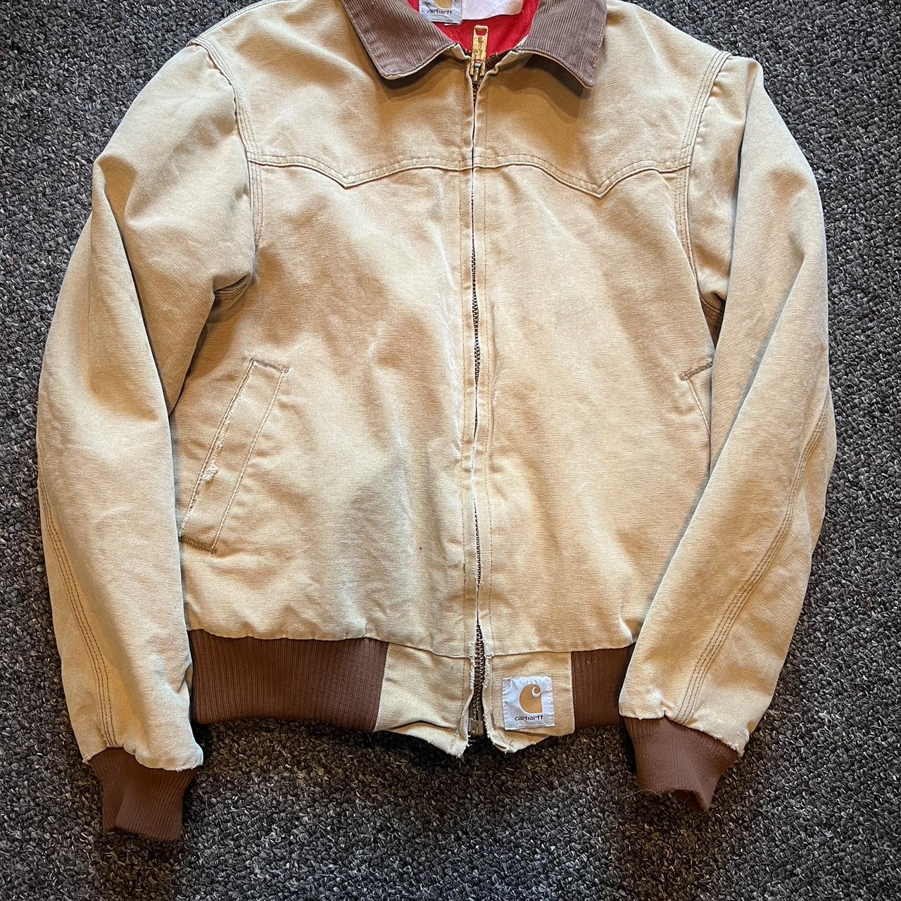 Tan Carhartt jacket with brown collar, featuring a... - Depop