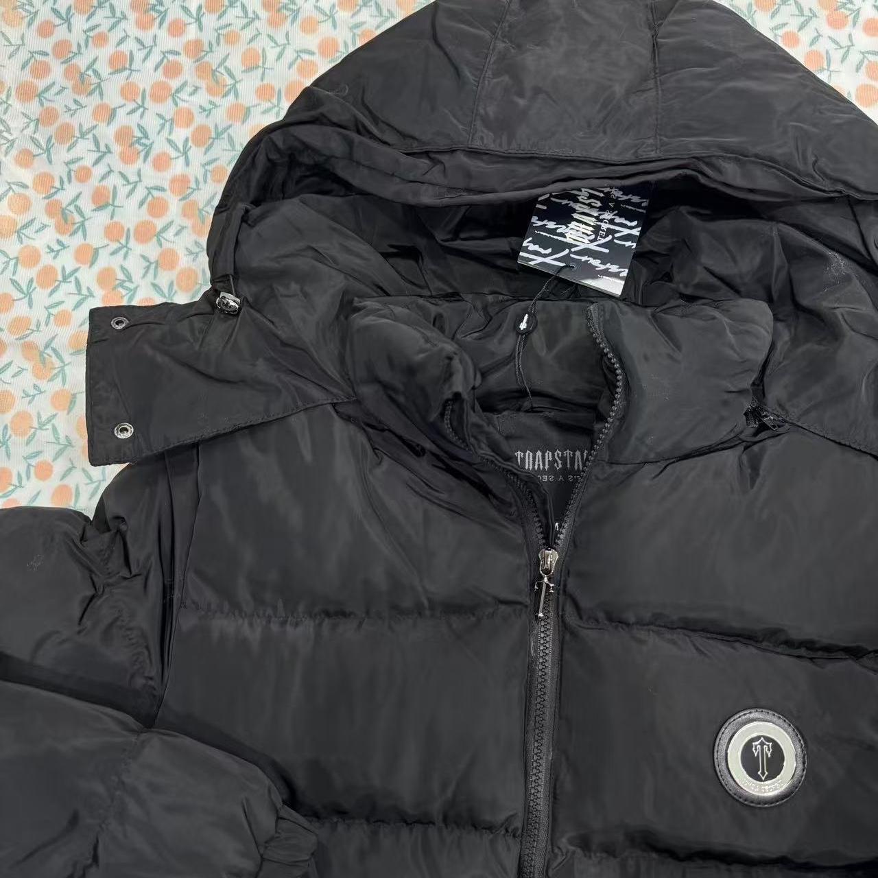 Trapstar Black puffer jacket with hood and zip up... | Depop