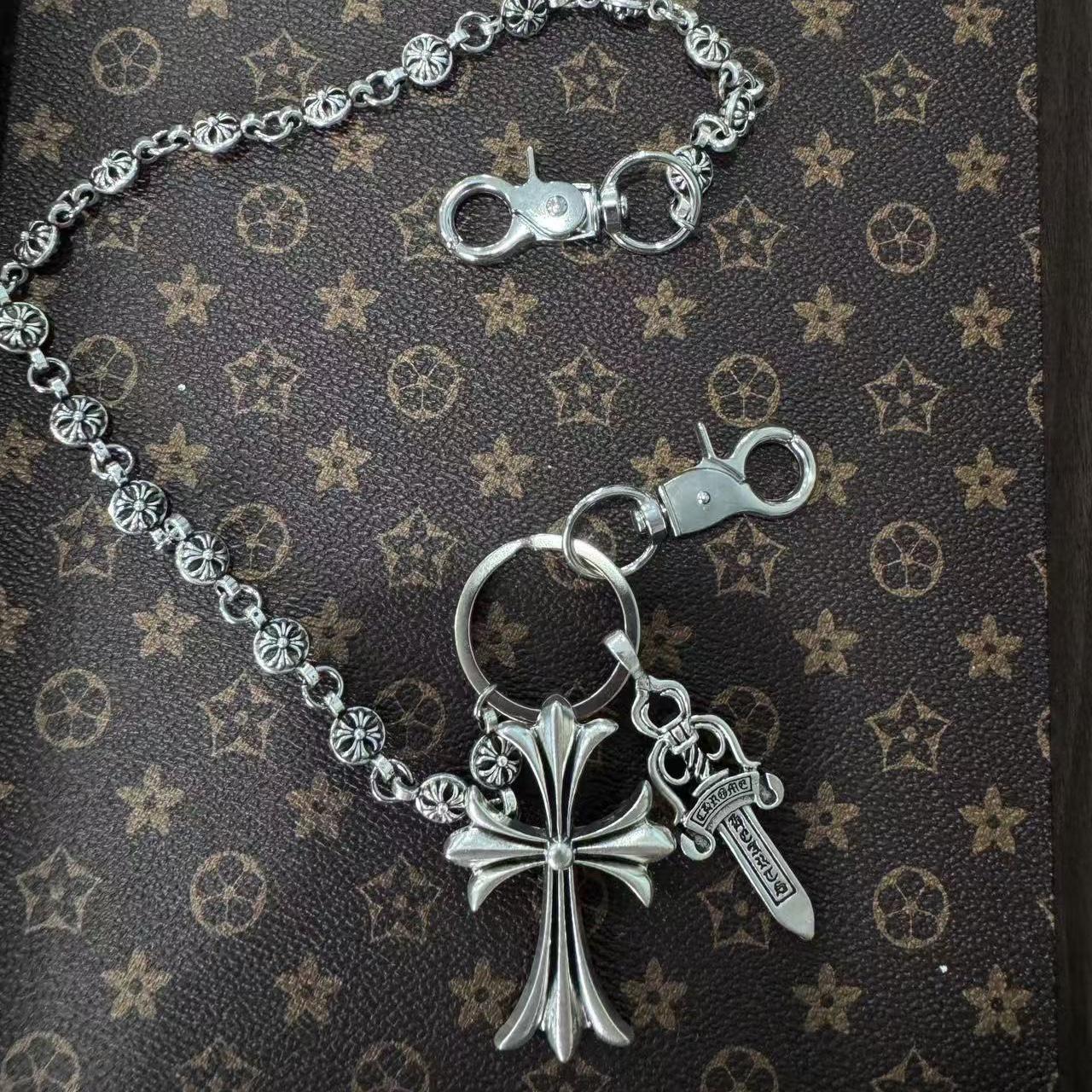Vintage vibe wallet chain with key chain and sword... | Depop