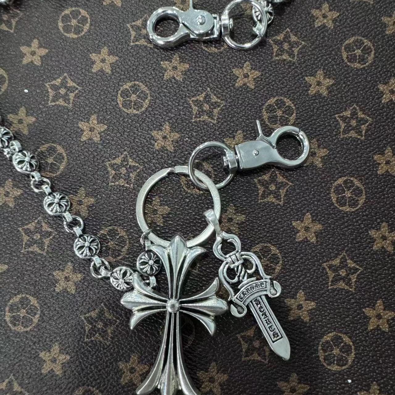 Vintage vibe wallet chain with key chain and sword... | Depop