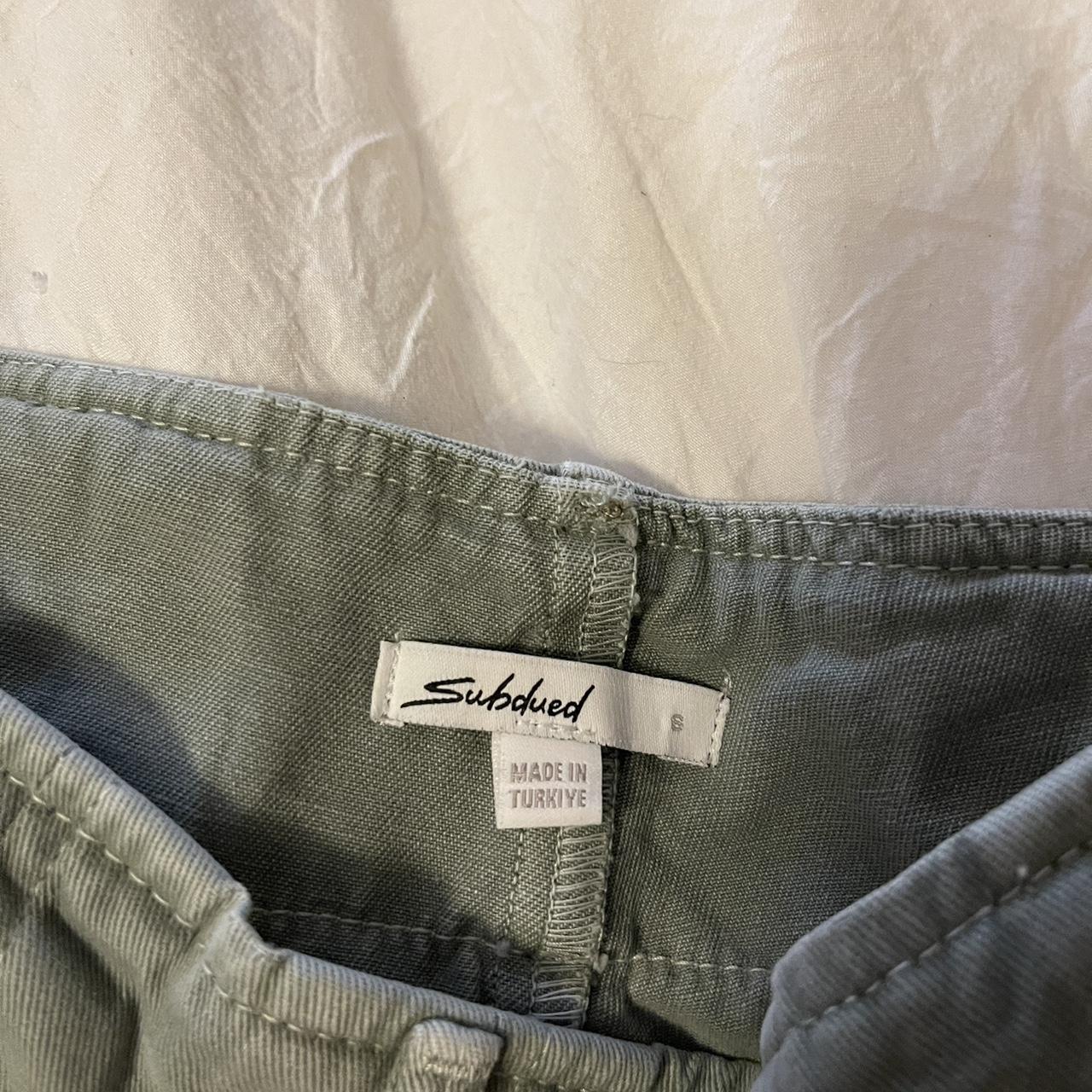 Subdued olive green Mini skirt Size small, worn... - Depop
