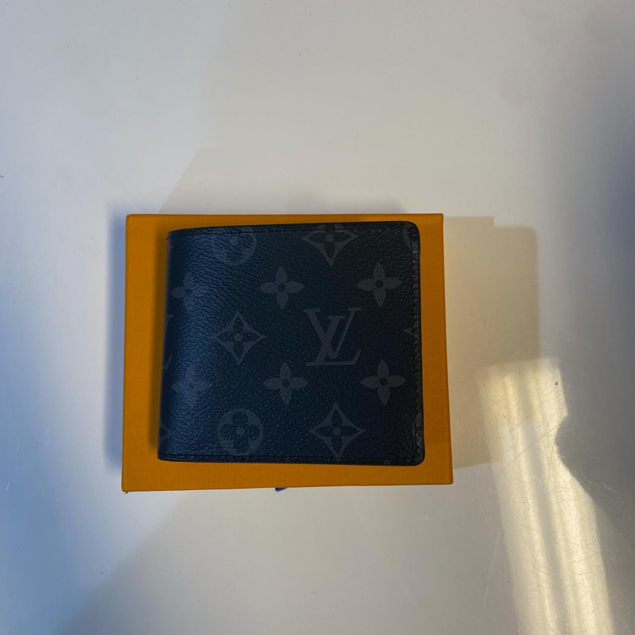 lv wallet- brand new- comes with packaging same day... - Depop