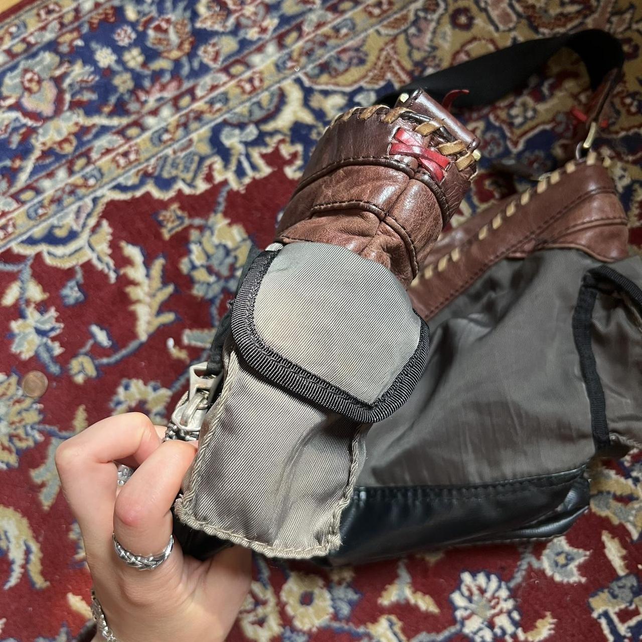 The perfect diesel bag… yet the inside is very worn.... - Depop