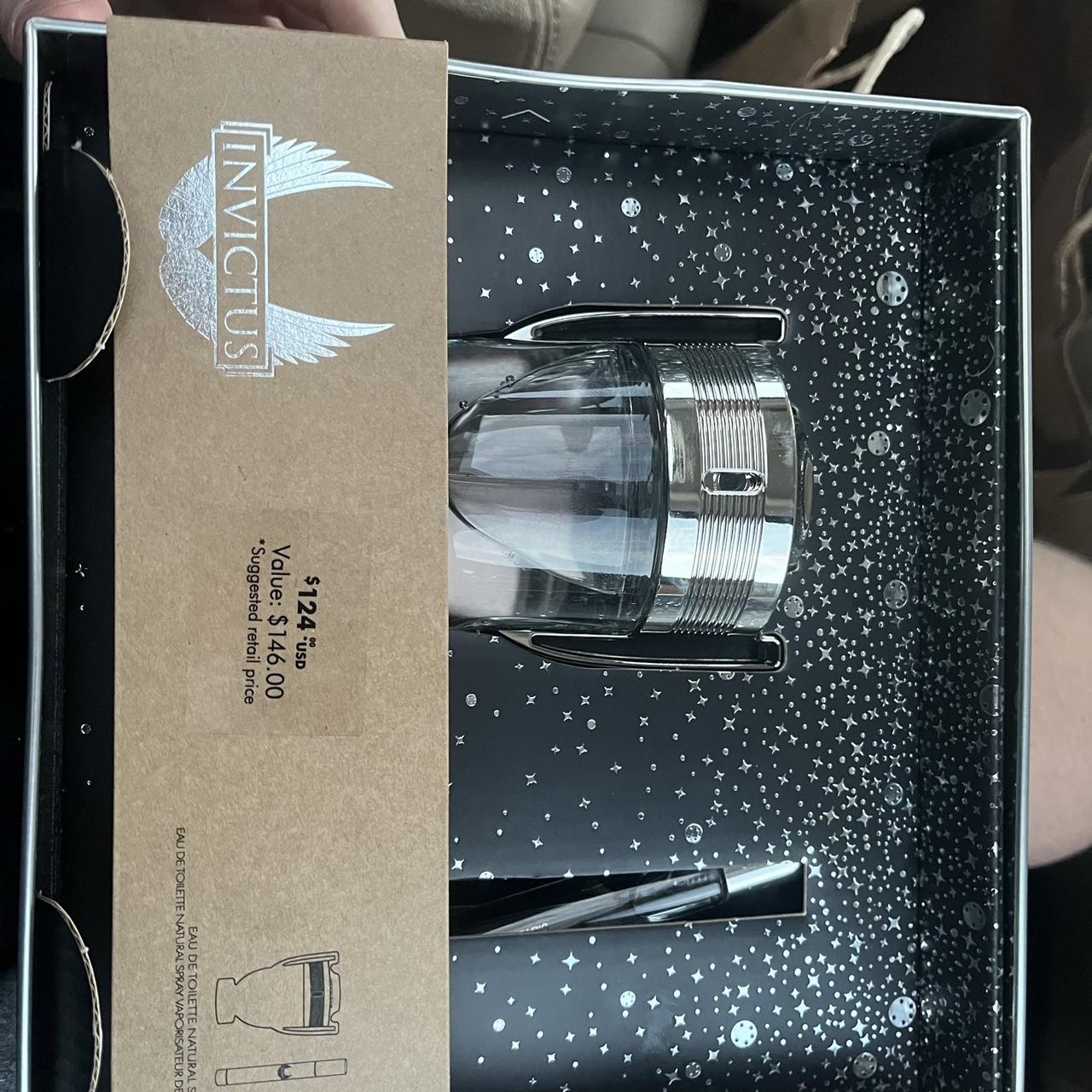 Mens cologne. Invictus 3.4 ounce bottle and travel... | Depop