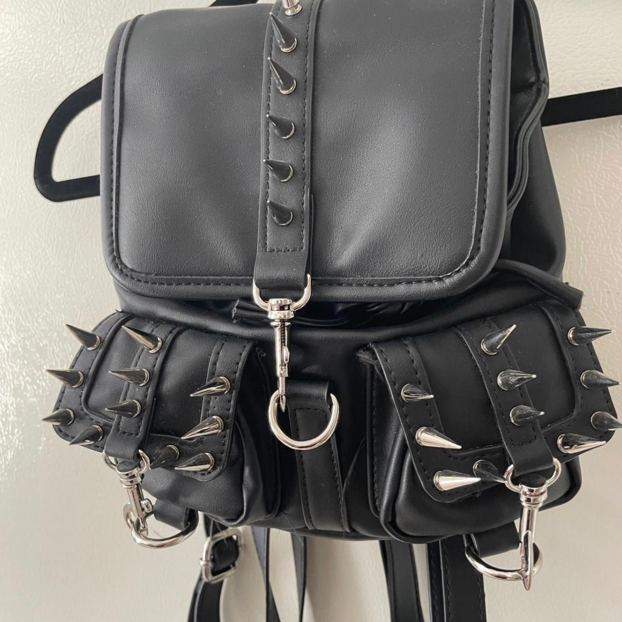 Mini spiked backpack. Brand is Current Mood. - Depop