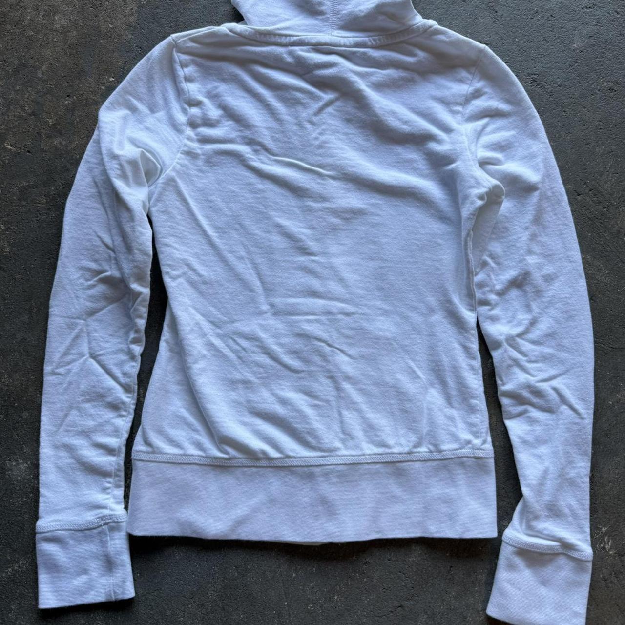 Y2K Miley Cyrus Slim Fitting White Zip-up Hoodie (I... | Depop