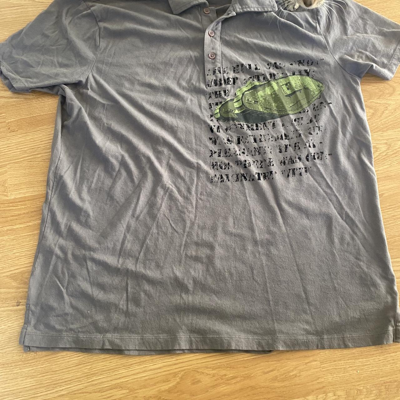 Khaki and green graphic affliction polo shirt... | Depop