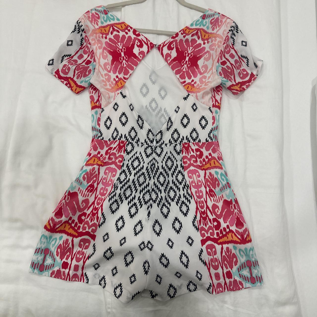 iconic 2000s vibrant bebe romper - featuring a... - Depop