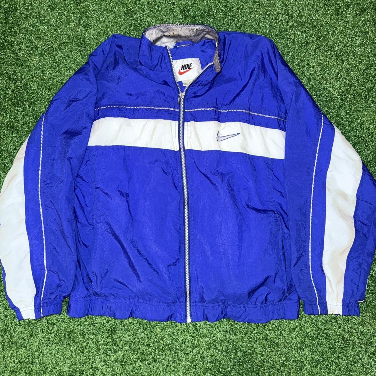 Vintage 90s Nike blue and white zip-up windbreaker... | Depop
