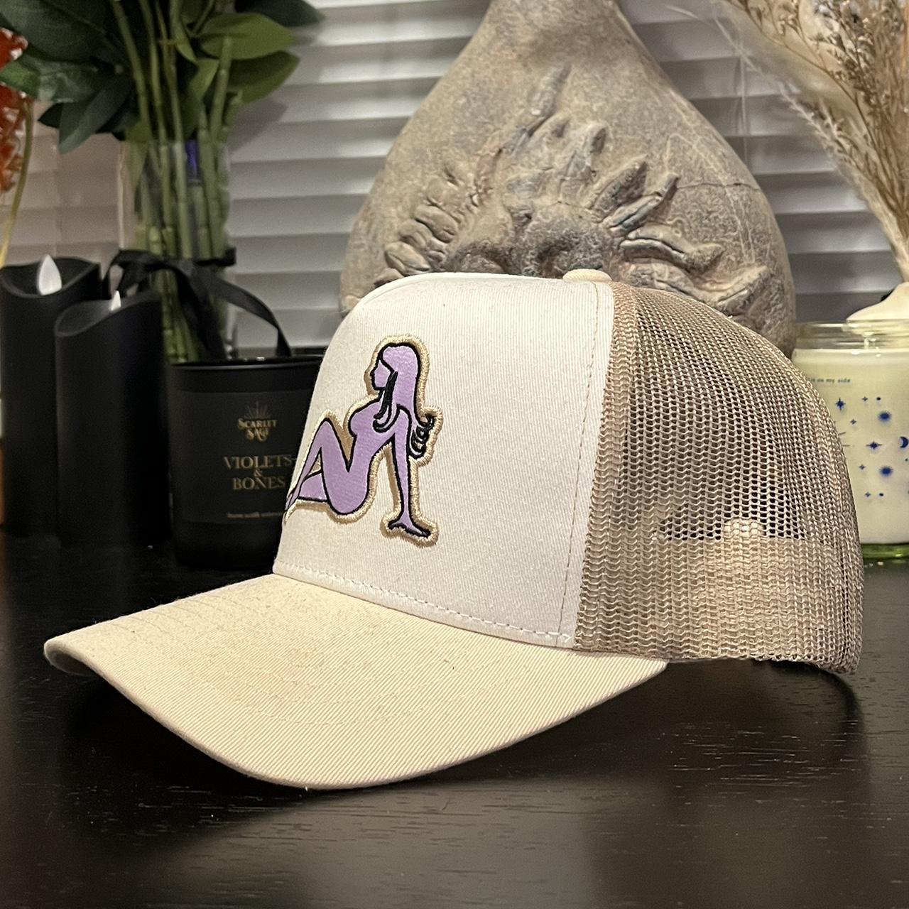 Never worn trucker hat with a purple lady embroidery... - Depop