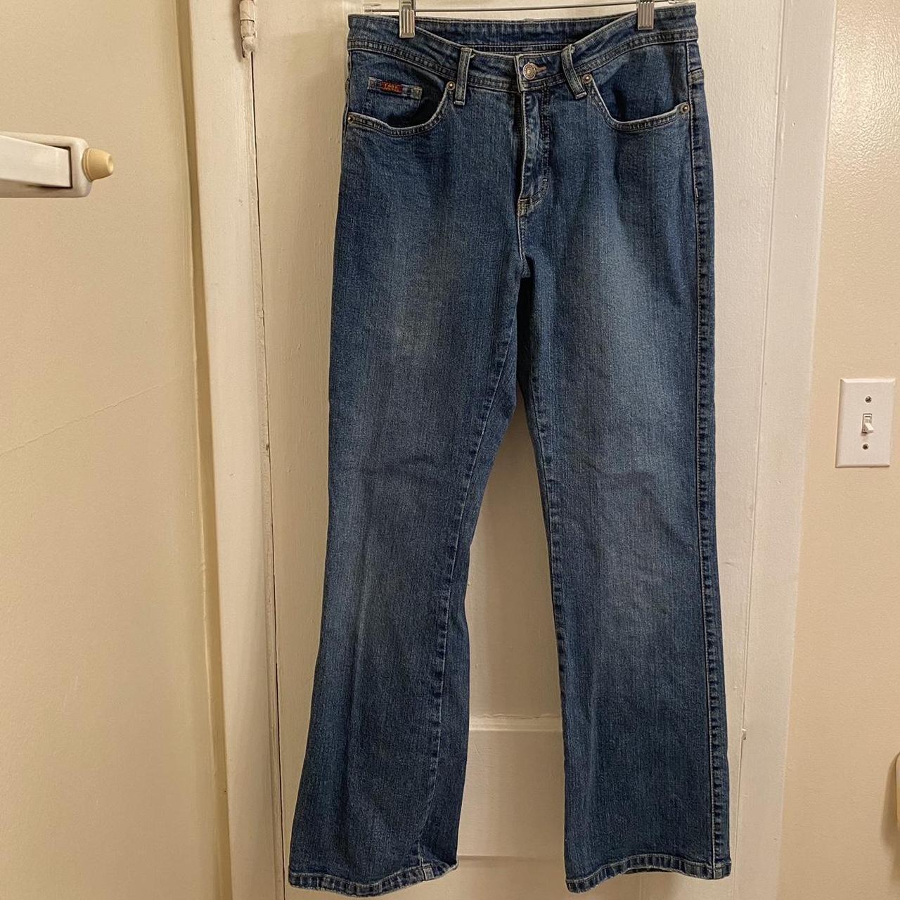 Low rise Lee jeans with a slight flare at the... - Depop