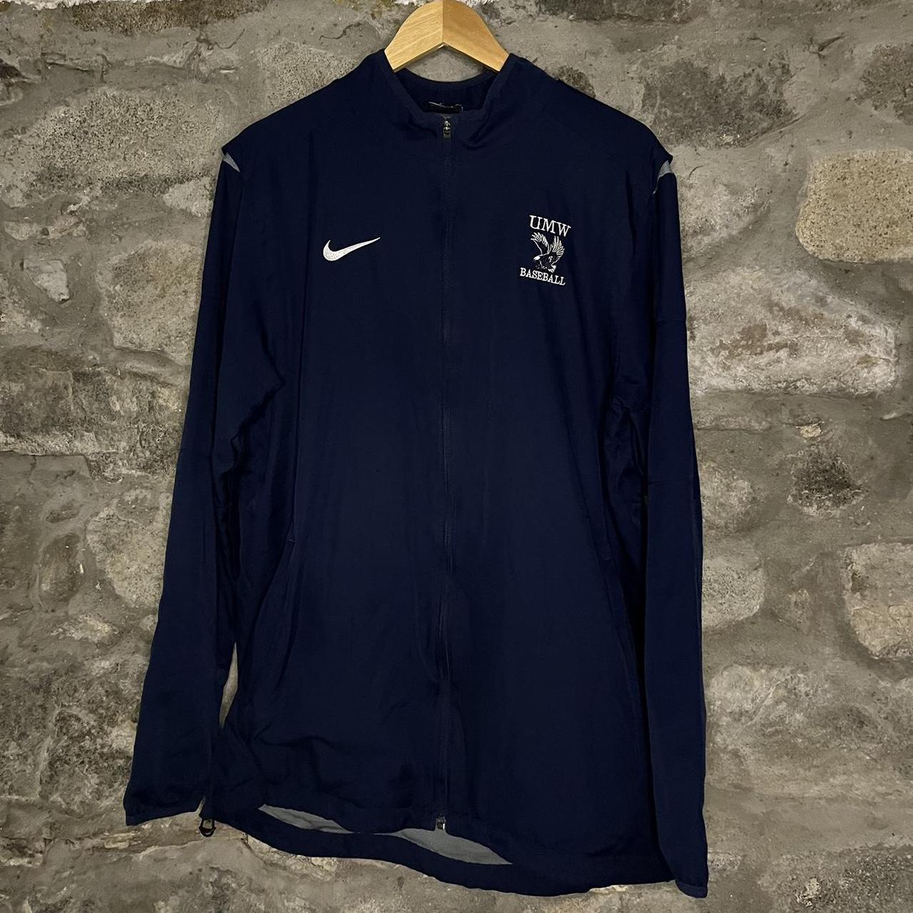Navy Nike baseball jacket with embroidered logo - Depop