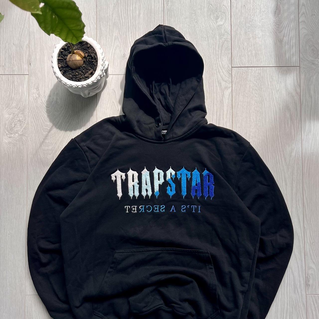 Trapstar black hoodie with blue and white design... - Depop