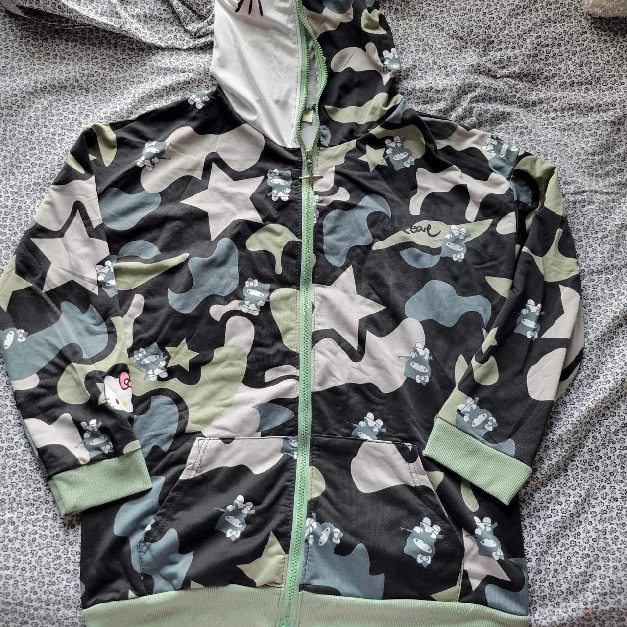 Hello Kitty camouflage zip-up hoodie in black and... | Depop