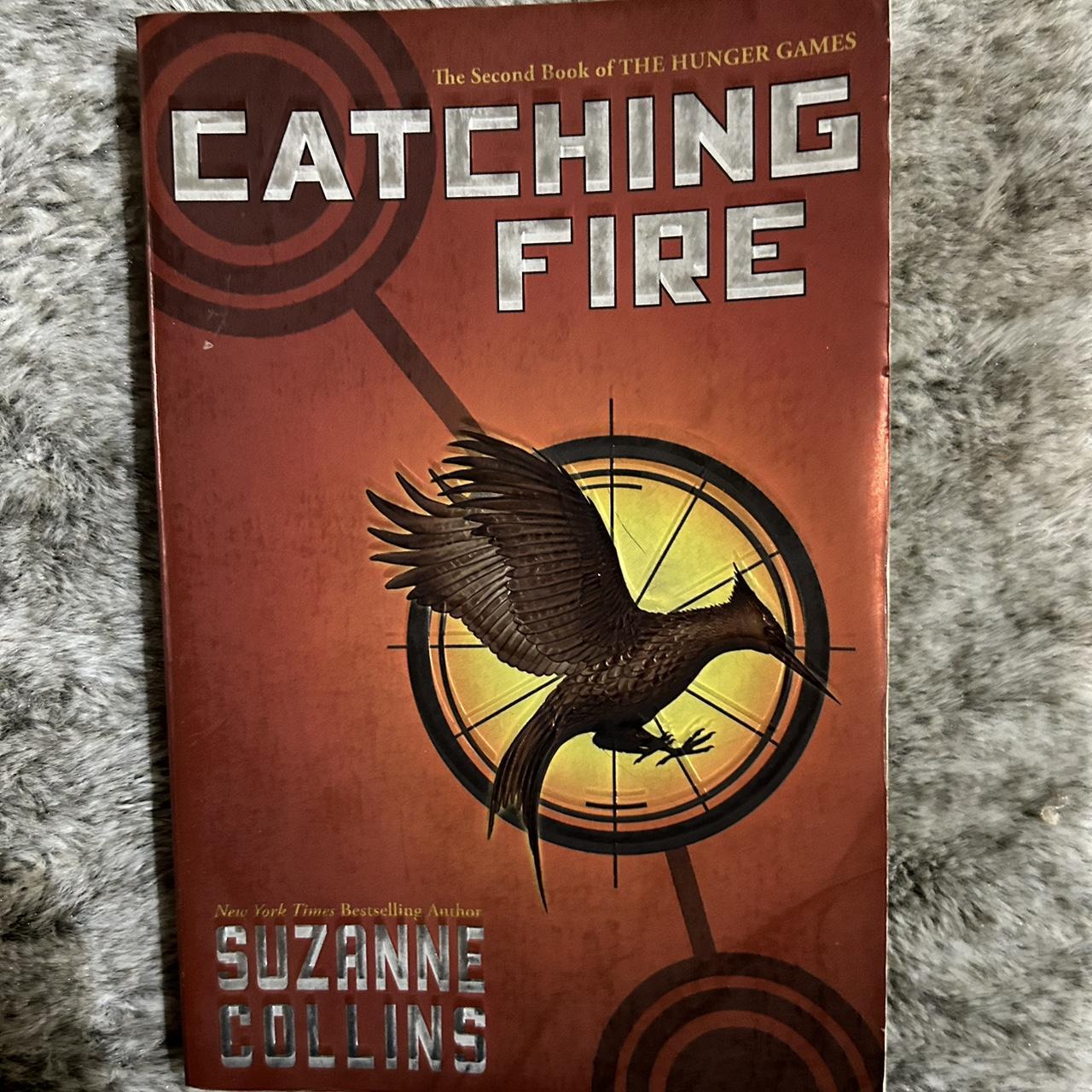 Catching Fire by Suzanne Collins #books... - Depop