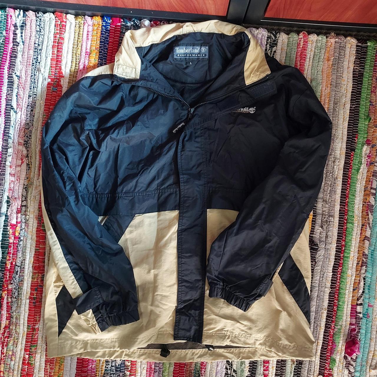 Large Timberland performance jacket. Black and beige... - Depop