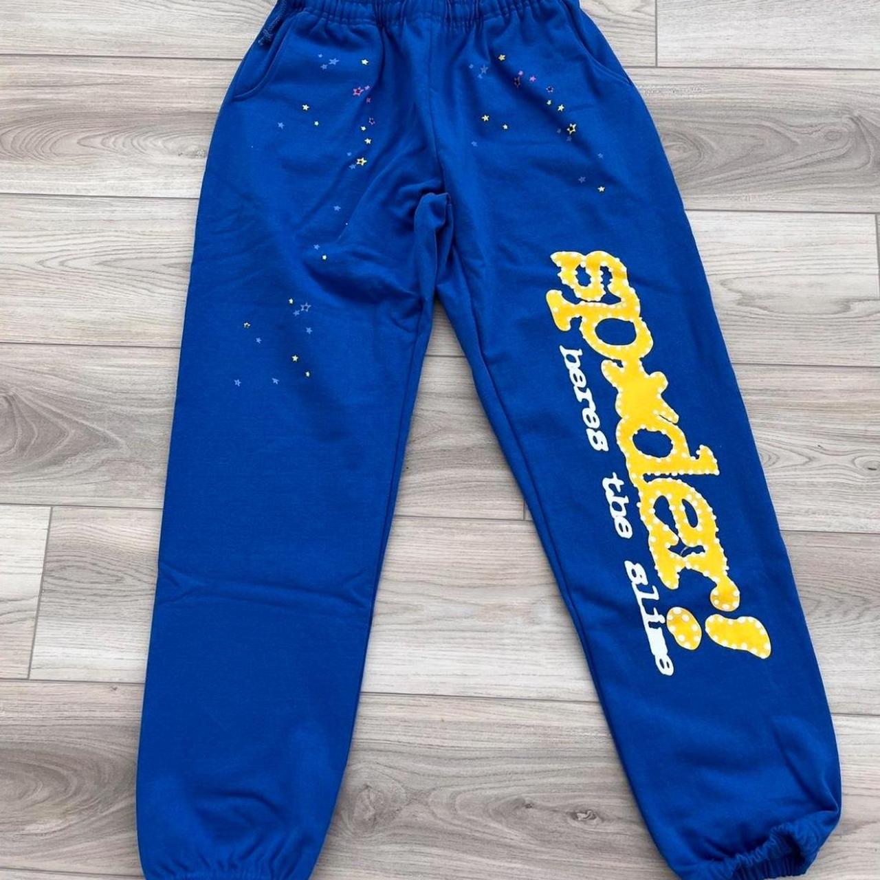 Blue Sp5der sweats - Depop