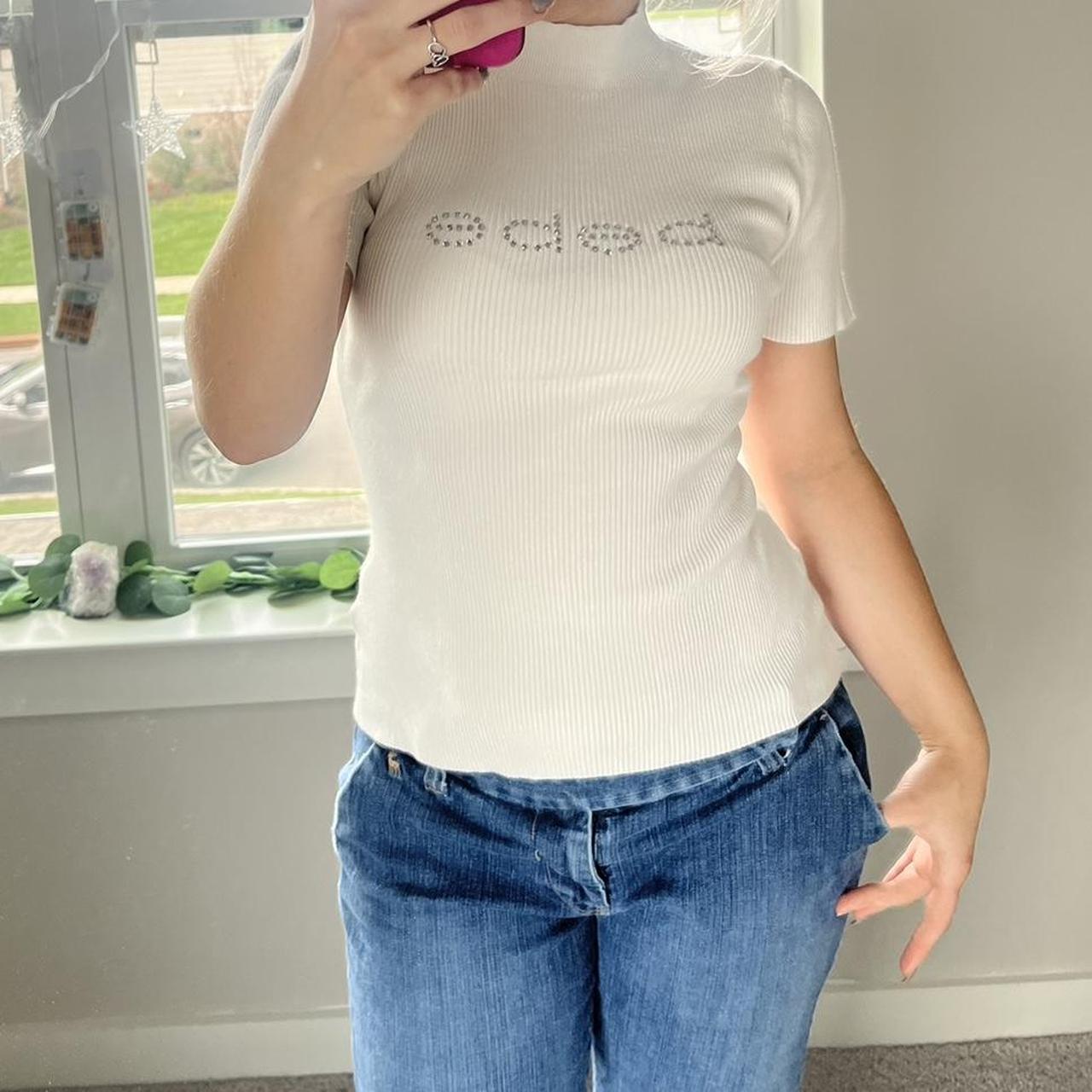 White rhinestone Bebe turtle neck baby tee... - Depop