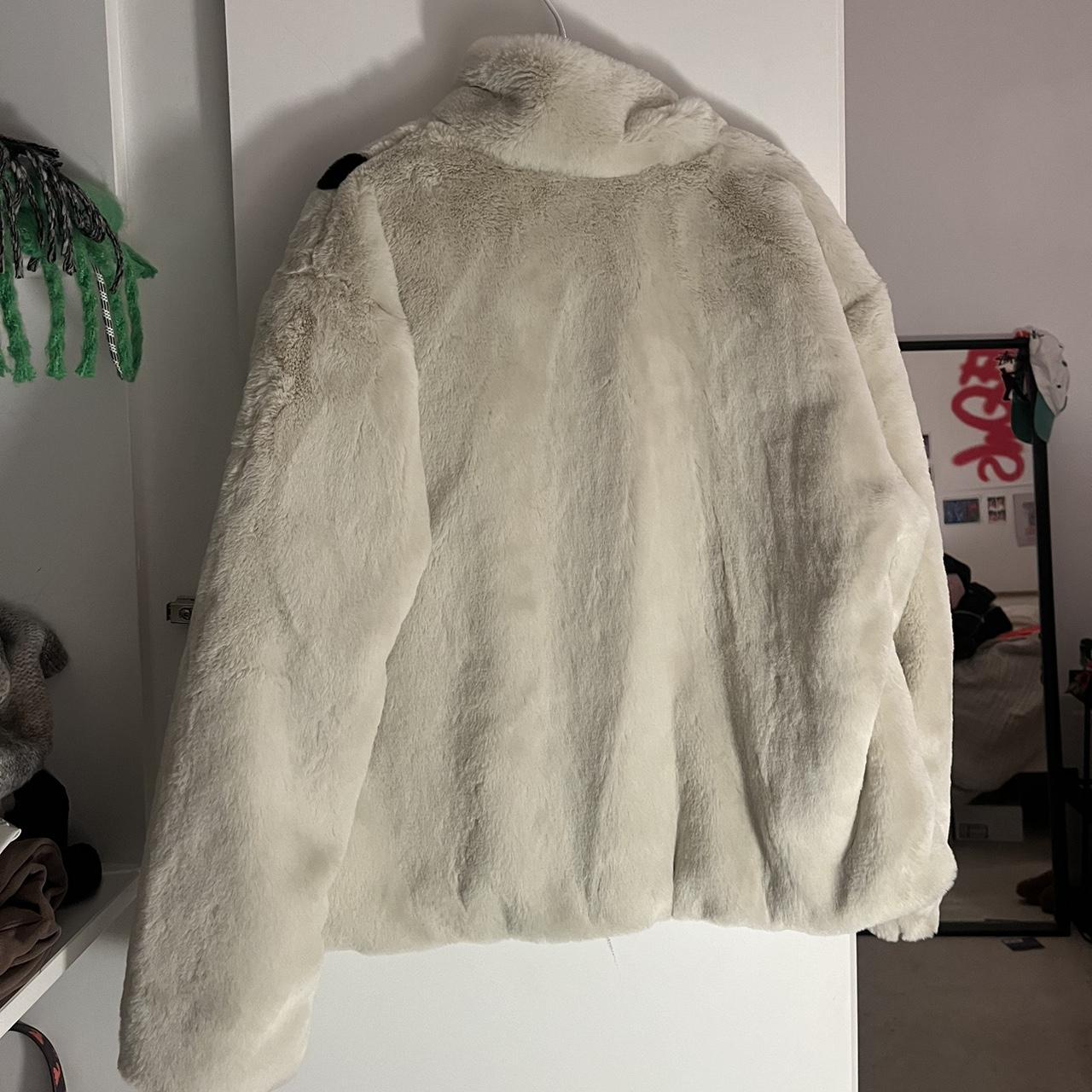 Nike fluffy white jacket/coat with black logo... - Depop