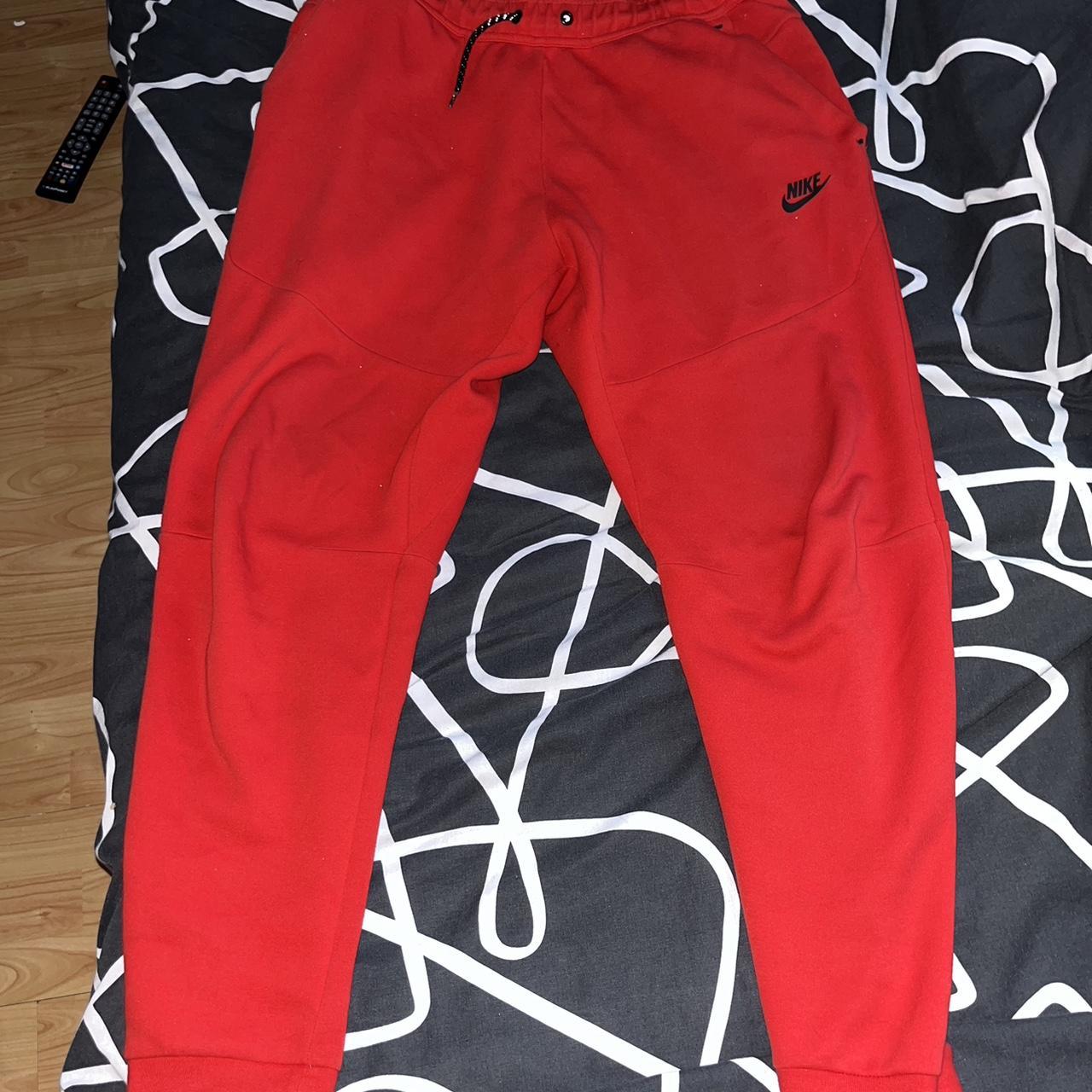 Red Nike tech fleece bottoms #nike #techfleece Open... - Depop
