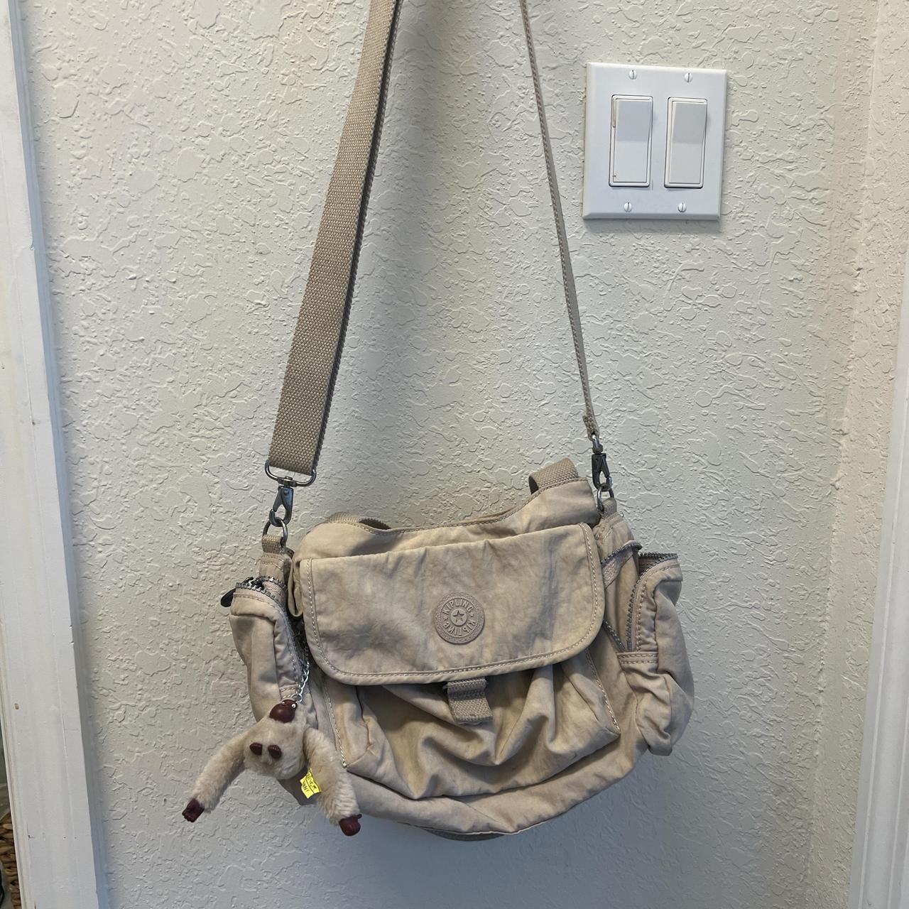 Cream beige large Kipling bag with monkey keychain.... | Depop