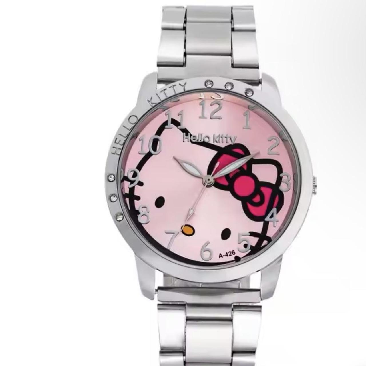 Hello Kitty ladies' silver watch with pink face and... - Depop