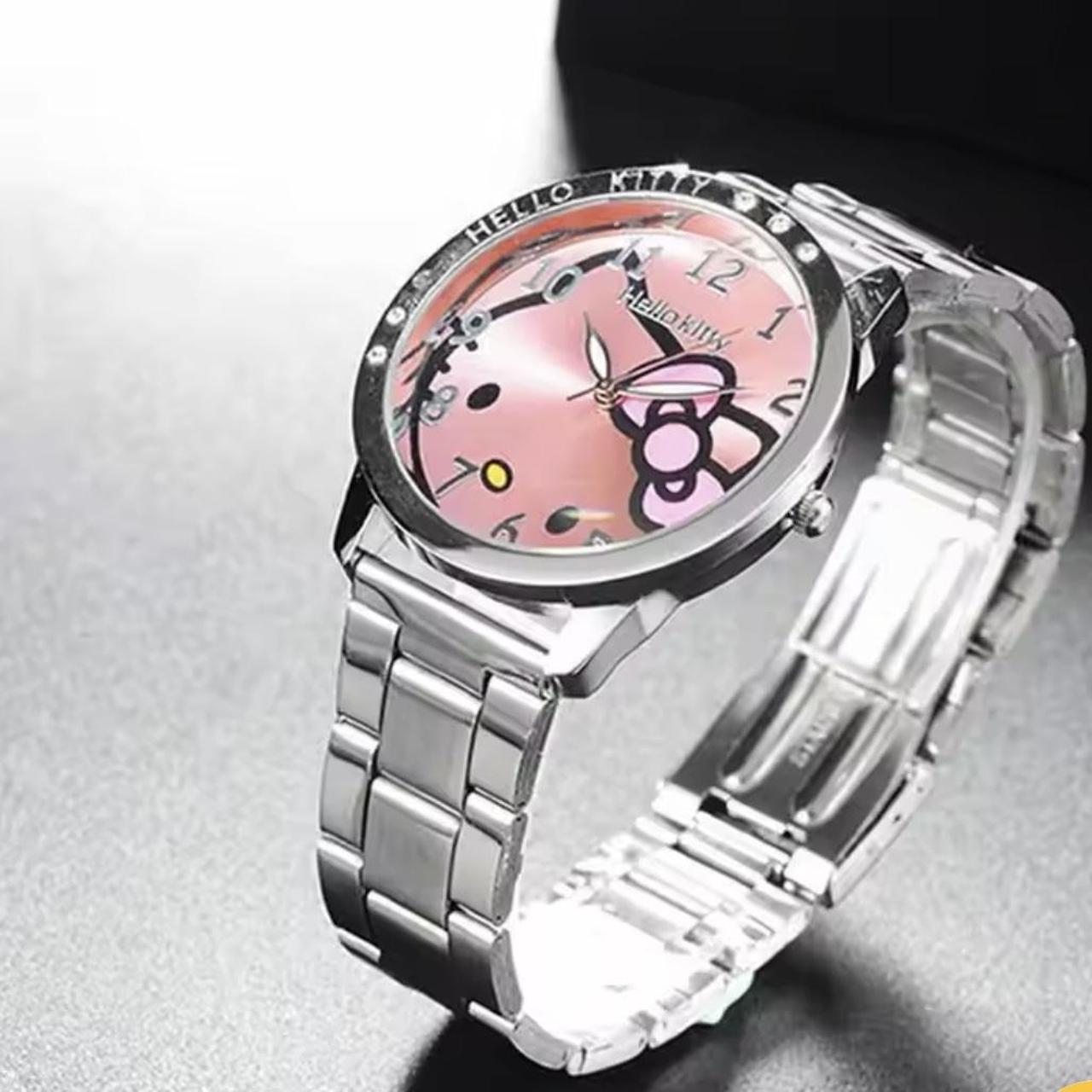 Hello Kitty ladies' silver watch with pink face and... - Depop