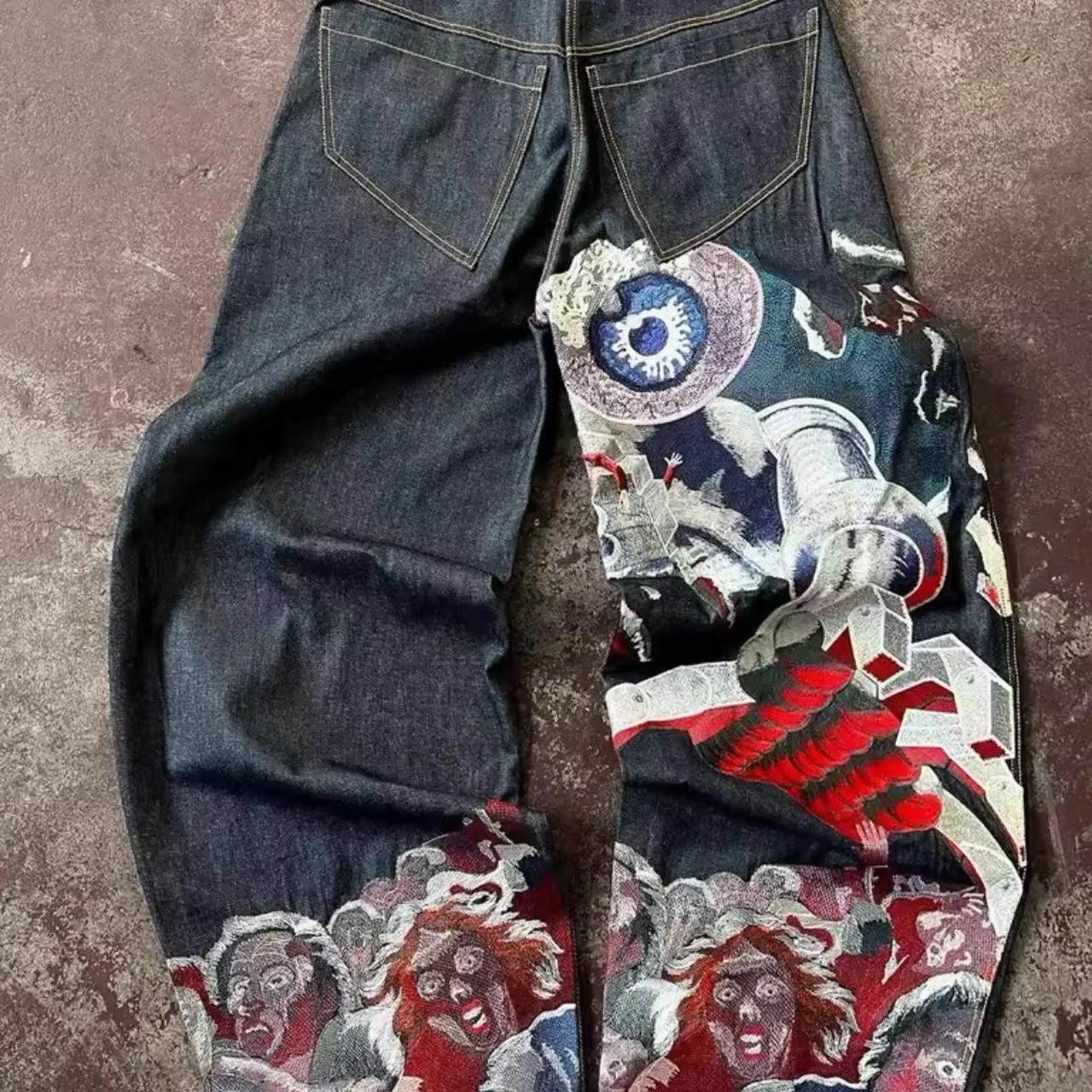 Crazy vintage jeans with eye patch and embroidered... - Depop