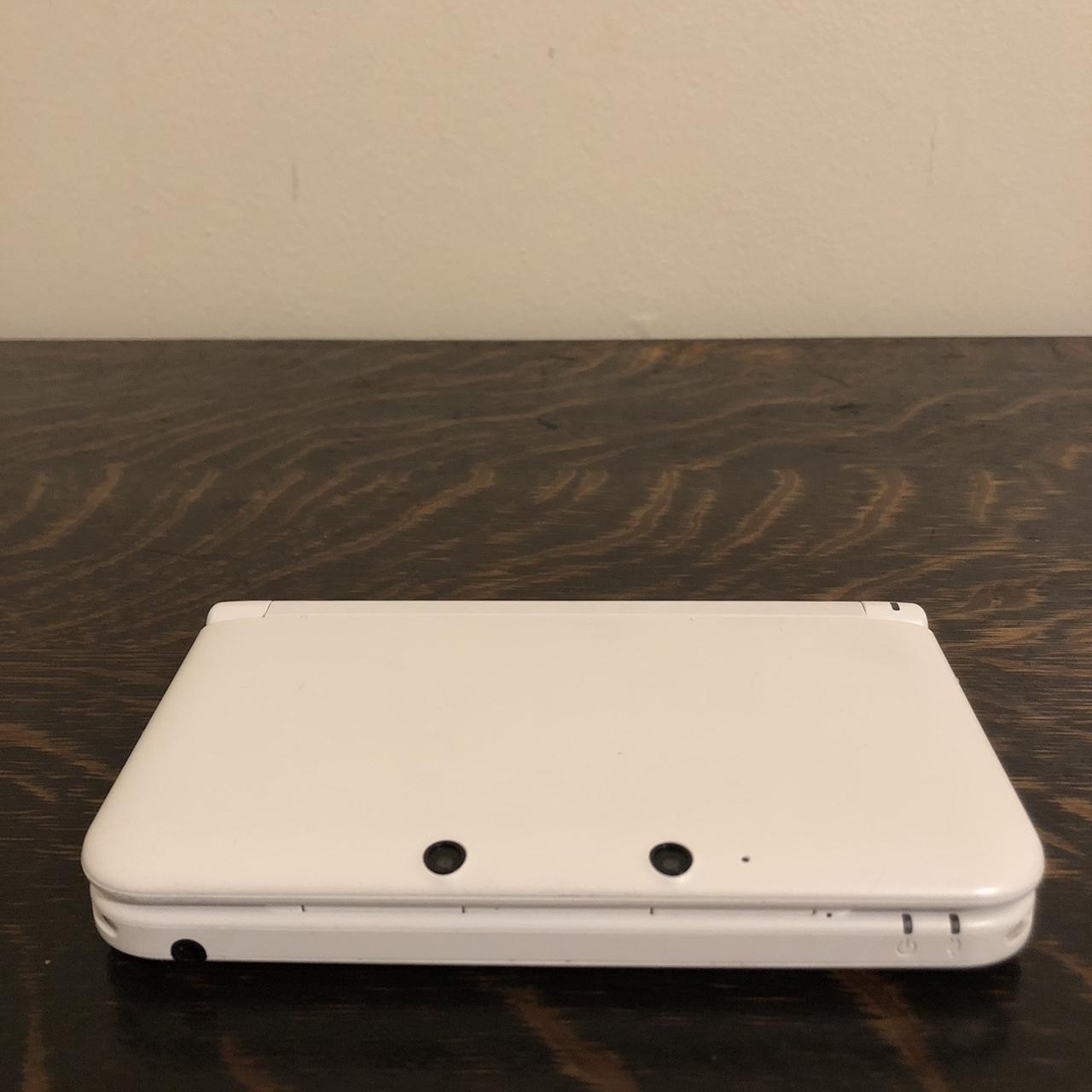 White 3DS XL with charger and screen protector, you... - Depop