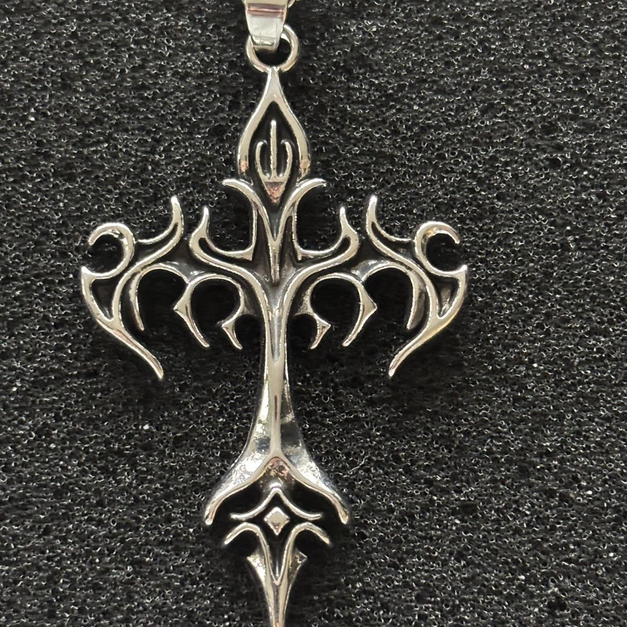 Silver coloured fire cross pendant necklace... - Depop