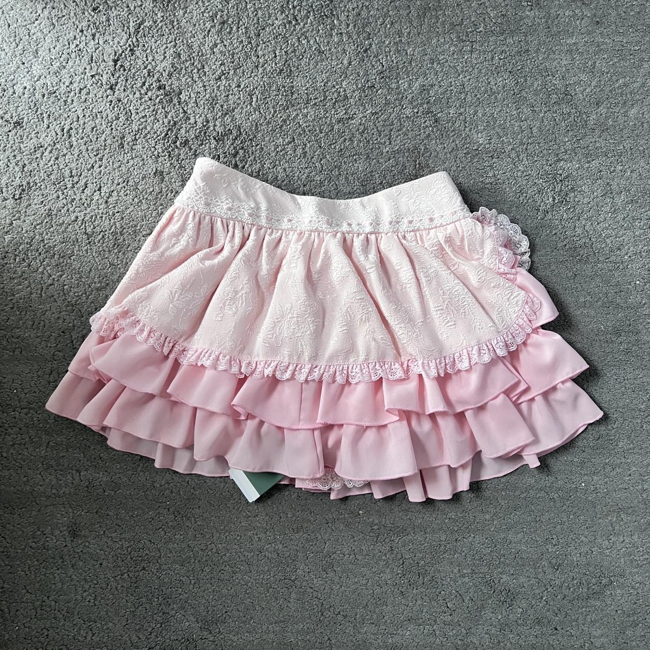 Cute pink ruffled mini skirt with lace trim From... | Depop
