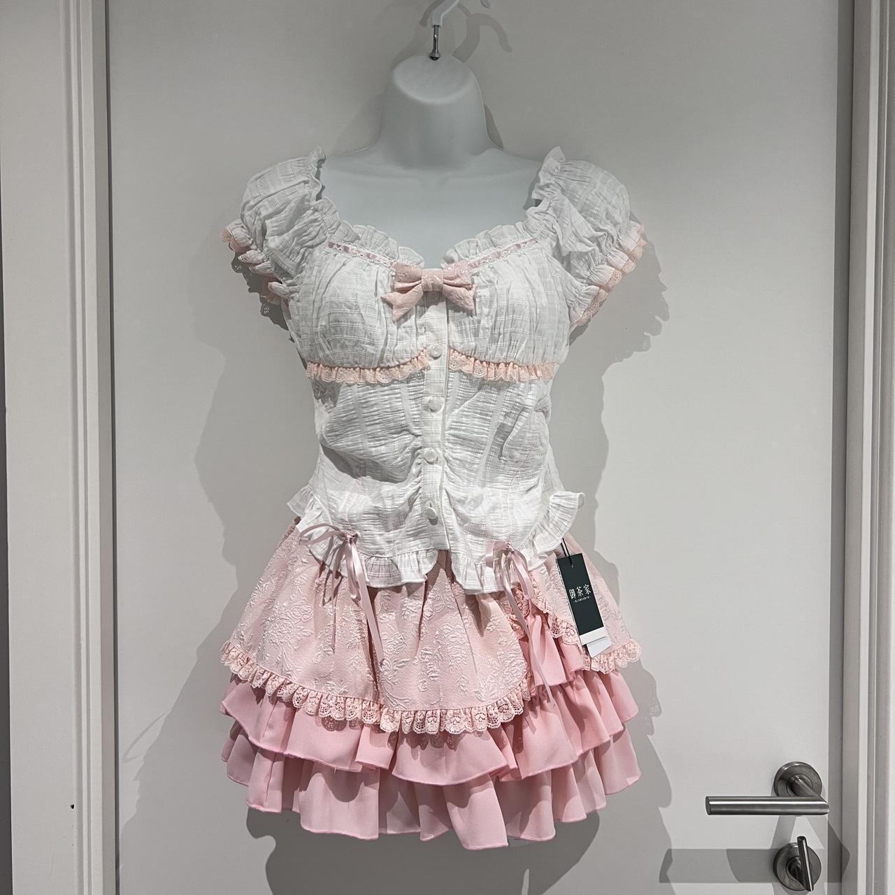 Cute pink ruffled mini skirt with lace trim From... | Depop