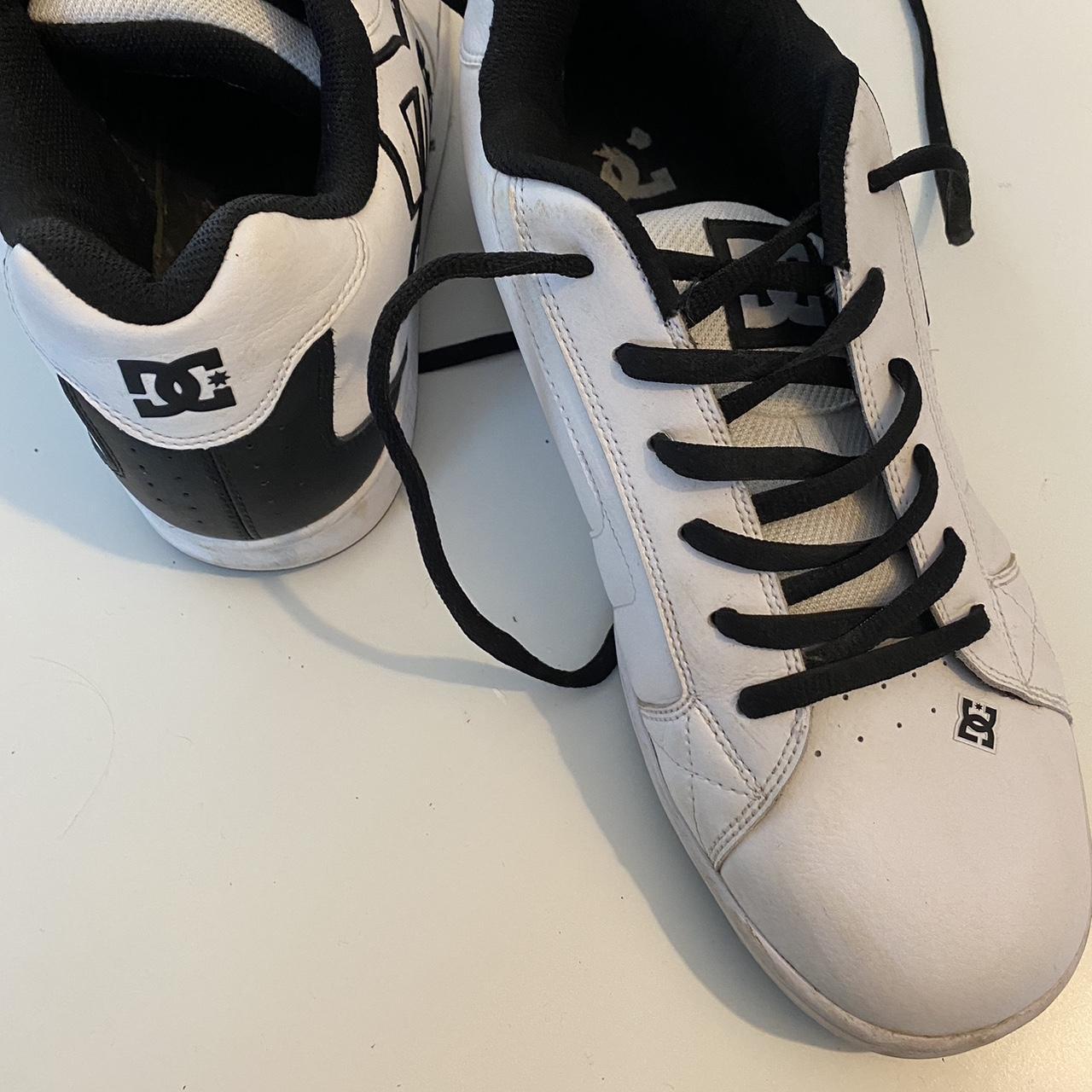 DC Shoes white and black trainers - Depop