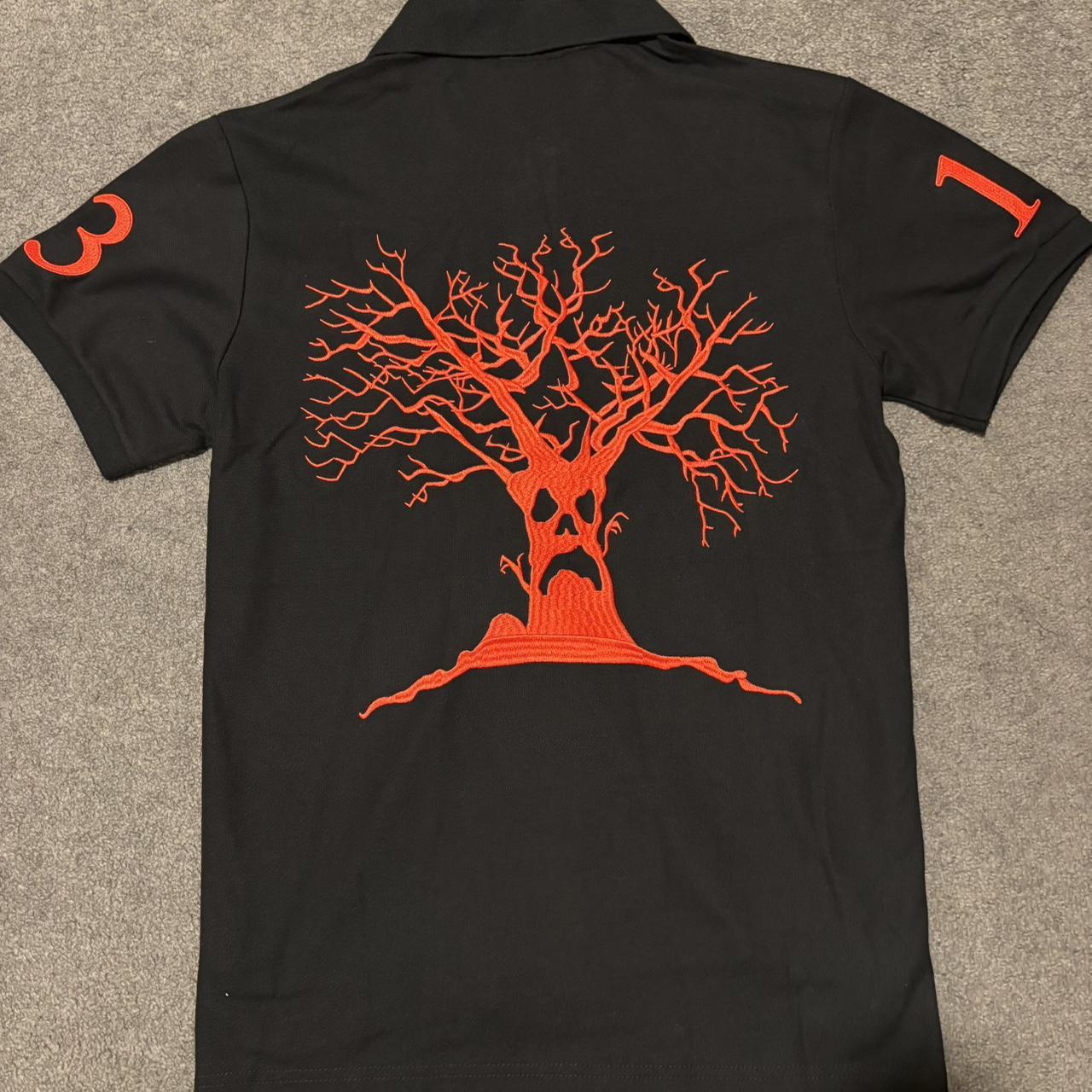 Black Haunted Mound polo. Worn once to try on.... - Depop
