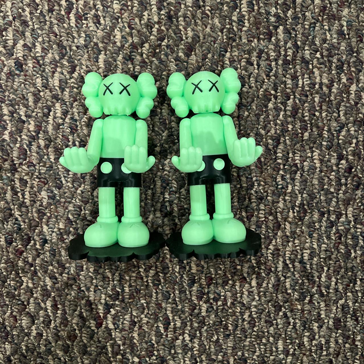 KAWS green and black controller holder GLOW IN THE... | Depop