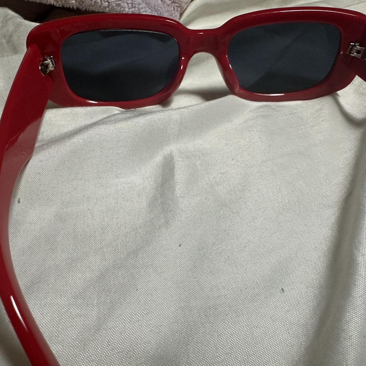 Red and black sunglasses... - Depop