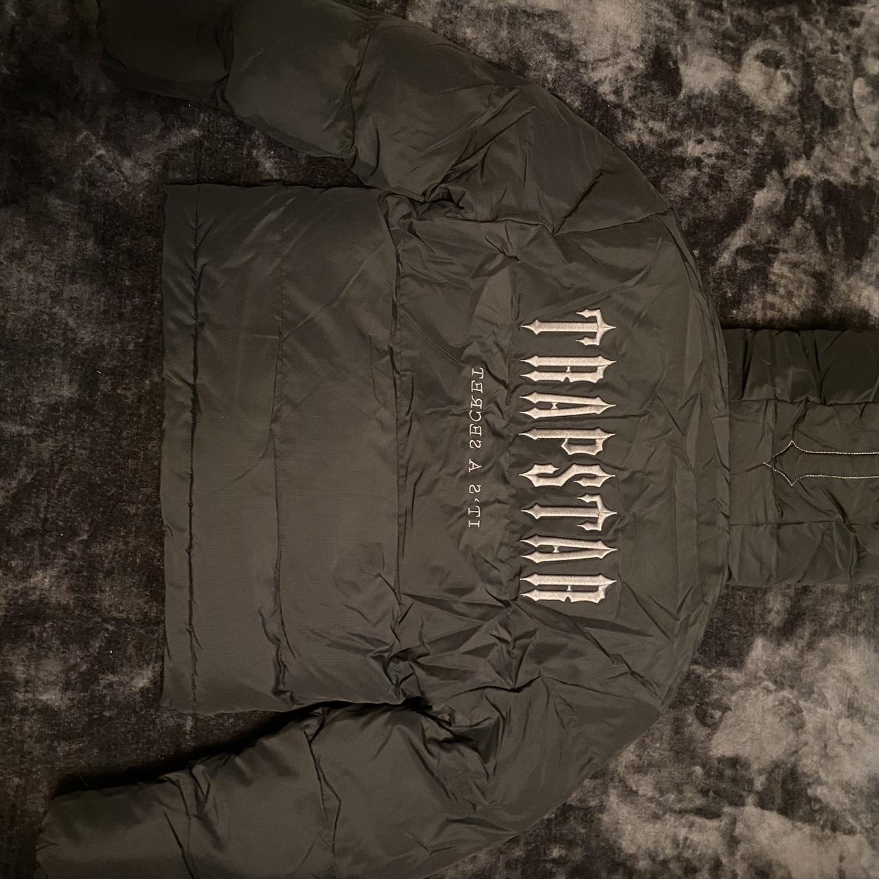 trapstar coat brand new with tags but has a tiny rip... - Depop