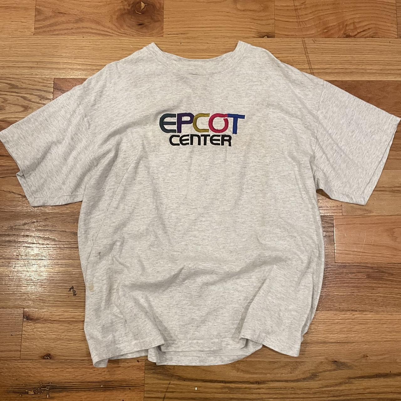 90s Disney Epcot Center grey and multi-coloured... - Depop