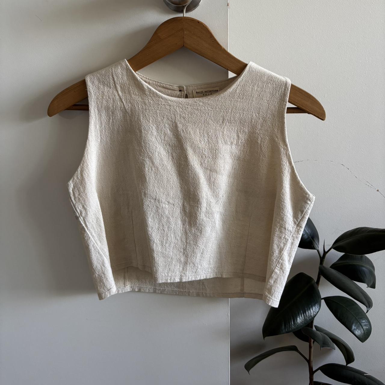 Cream cropped linen tank top with a relaxed fit... - Depop