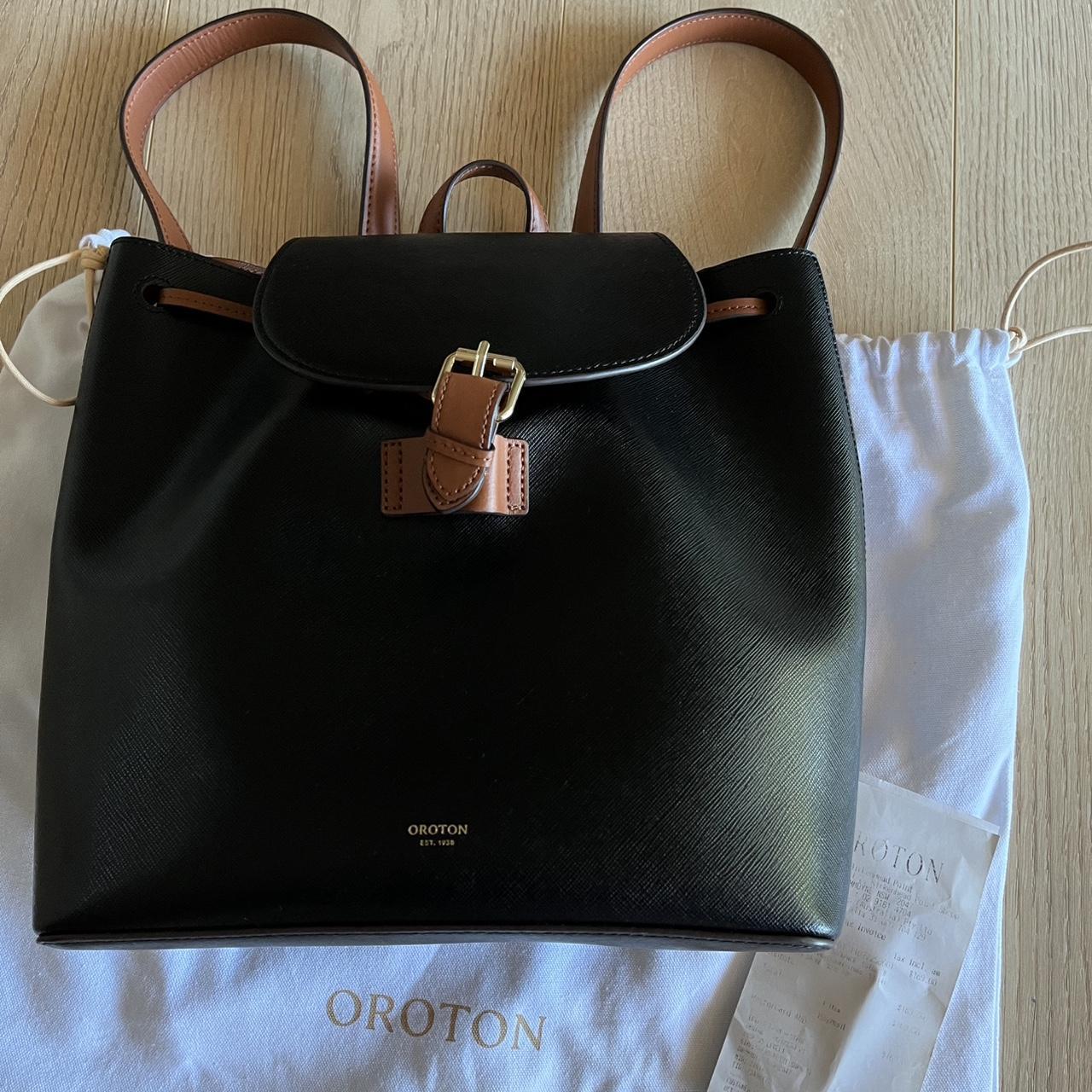 Only one time used Black leather Oroton backpack... | Depop