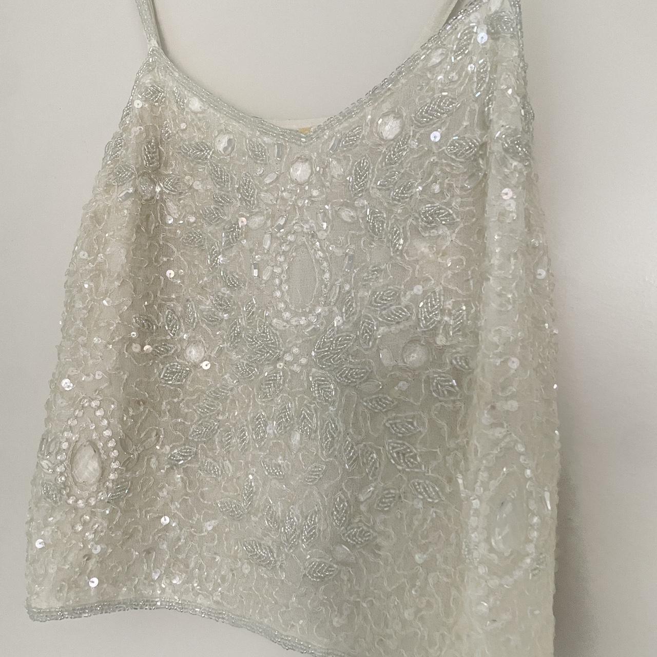 White beaded tank top with silver details... | Depop