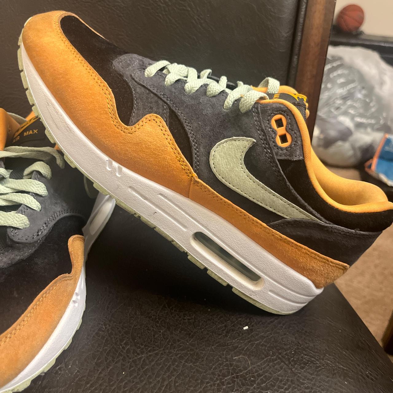 Nike Air Max 1 trainers in black and orange... - Depop