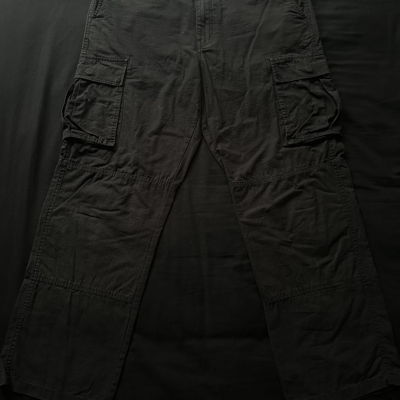 Black neovision cargo pants - Depop