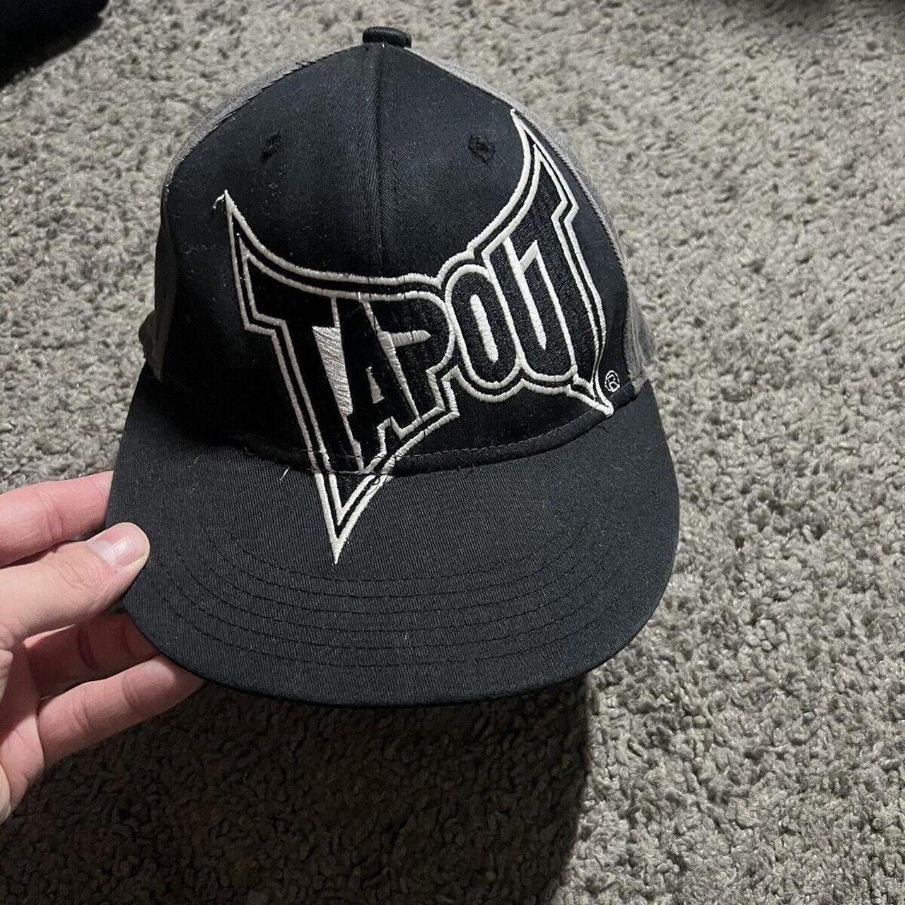 This is a Tapout baseball cap in black, designed for... | Depop