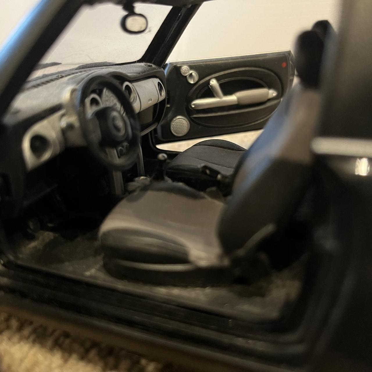 Mini Cooper checkerboard black and white toy car... - Depop