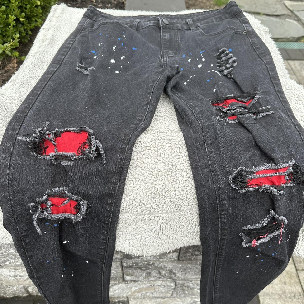 Amiri style Black and red paint splattered denim jeans | Depop