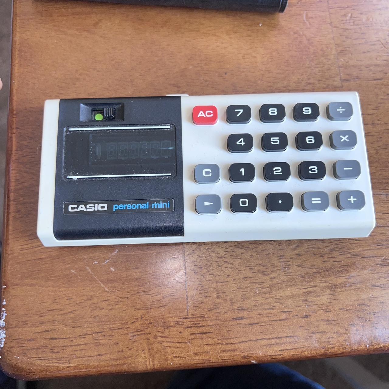 Casio personal mini calculator in black and white... | Depop