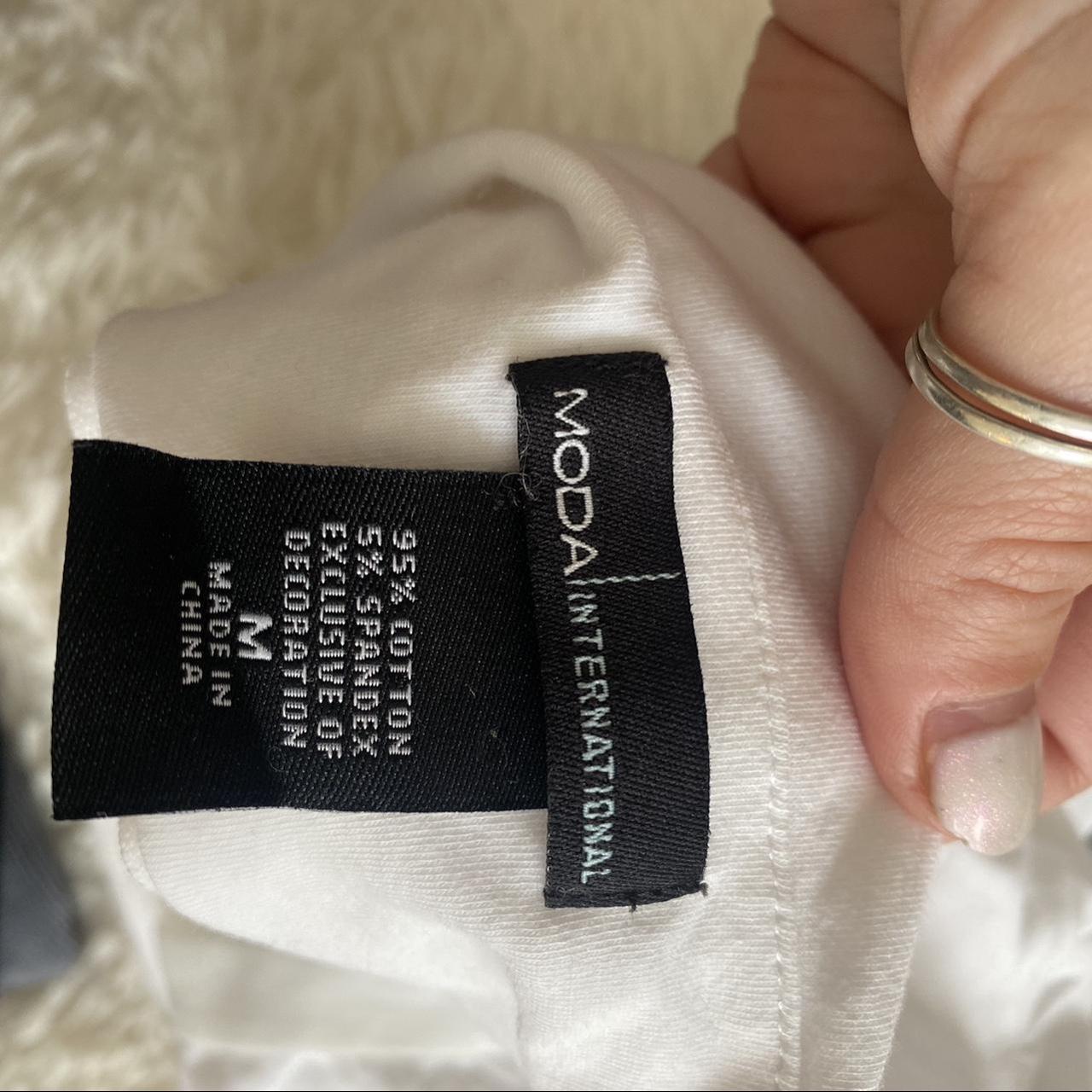 Moda International 90s tank. Super flattering with... - Depop