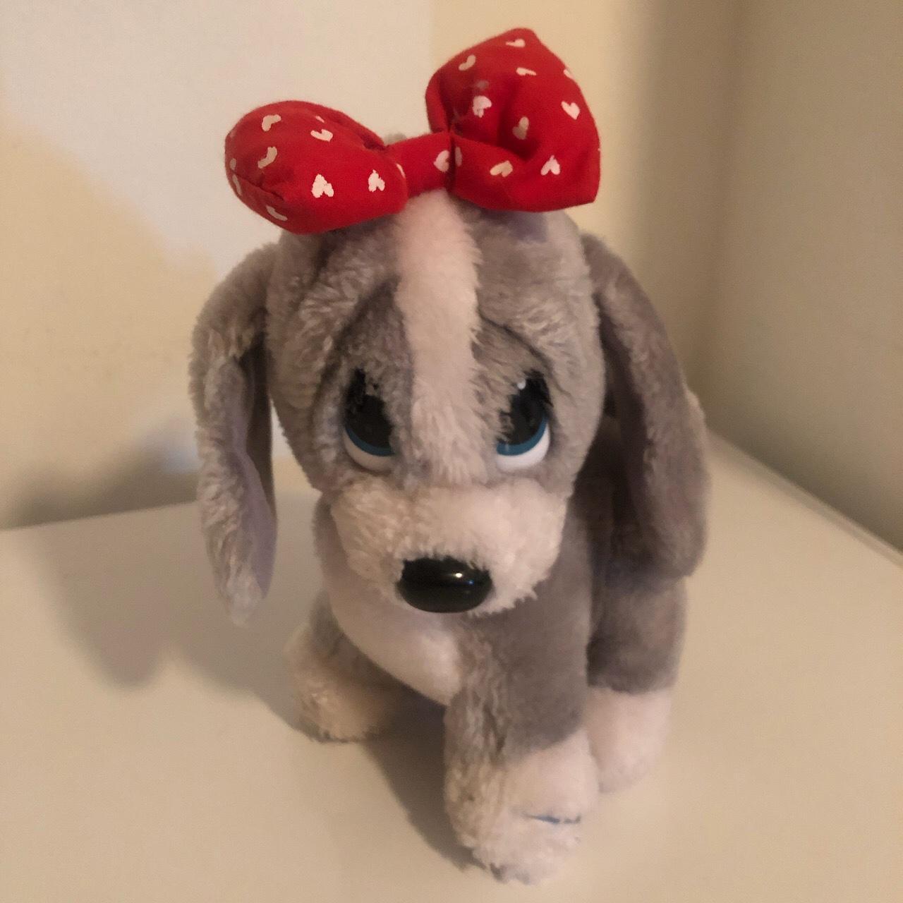 Small adorable grey retro vintage Sad Sam puppy