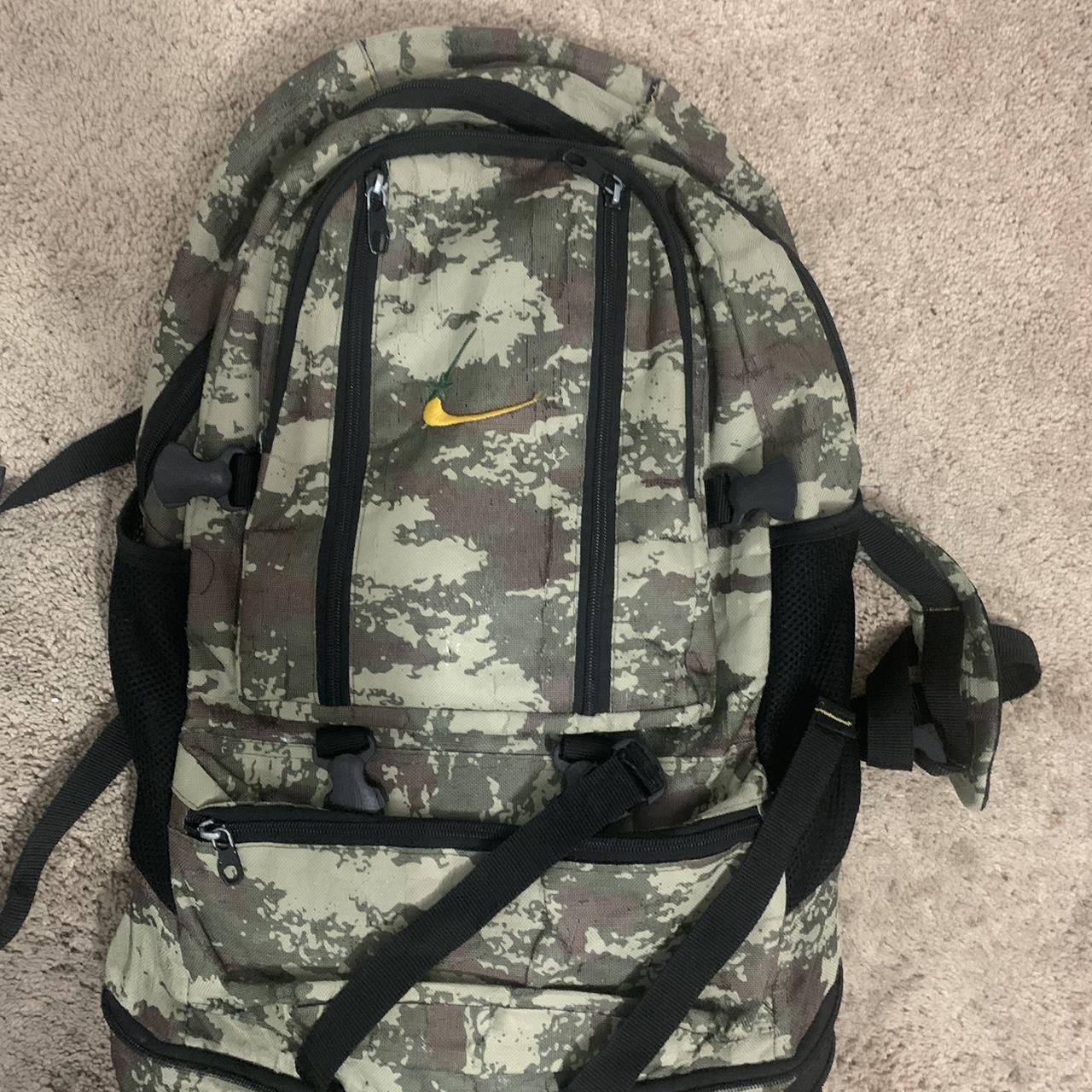 Nike camo backpack with multiple pockets... - Depop